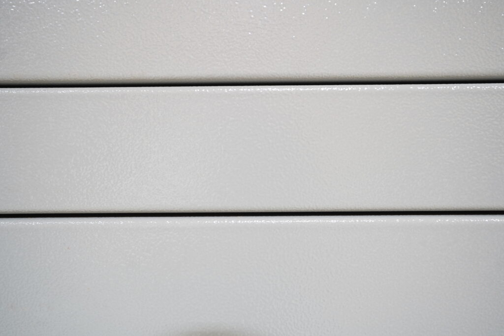 Door finishes resist corrosion - Metal Architecture