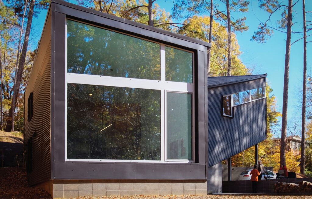 Box-rib Metal Panels Wrap House on Hillside - Metal Architecture