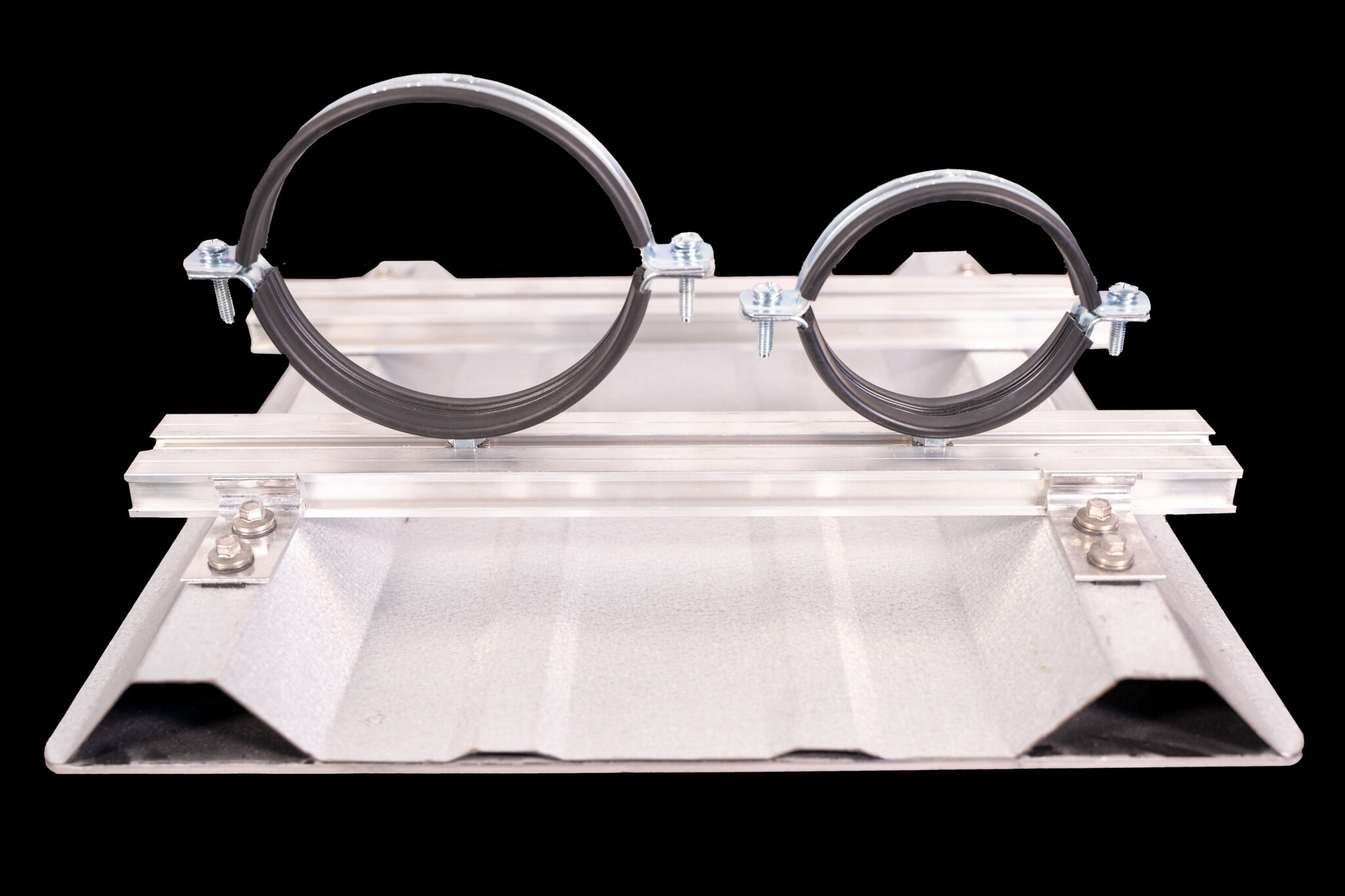 Clamps secure piping - Metal Architecture