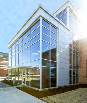 Glass transforms store, warehouse - Metal Architecture