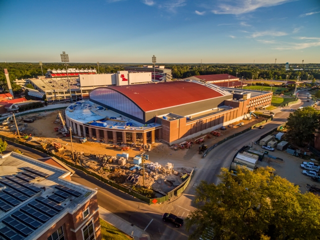 Curved roof tops basketball arena - Metal Architecture